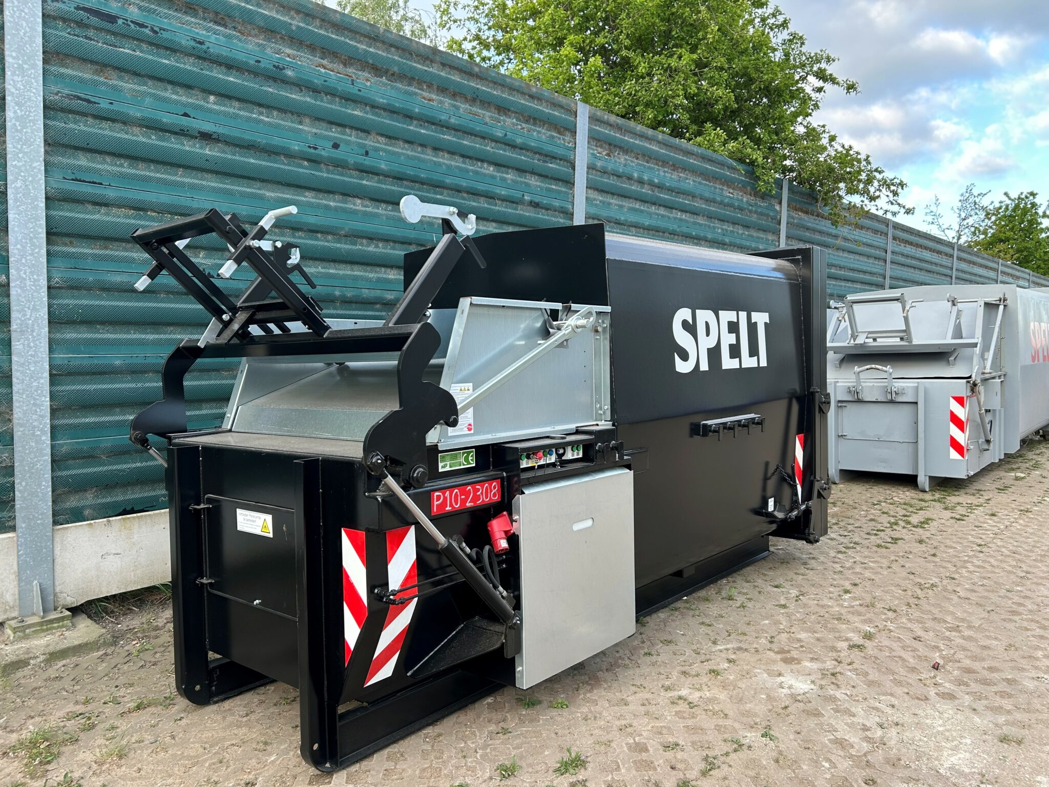 Spelt afvalinzameling en grondwerken